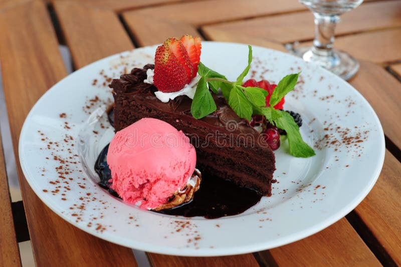 Chocolate Cake with Garnish Stock Photo - Image of sauce, leaf: 4819890