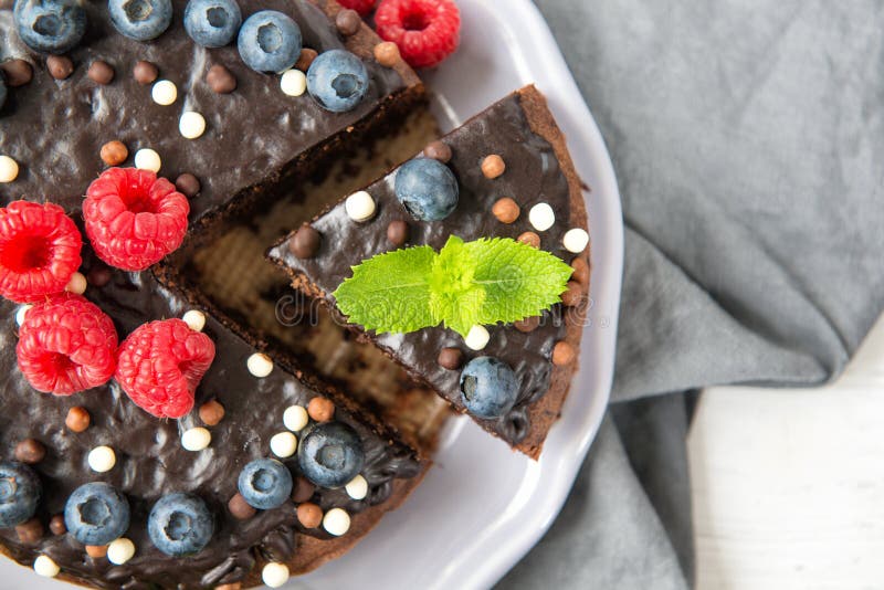 Chocolate Cake with Chocolate Icing, Raspberries, Blueberries and Mint ...