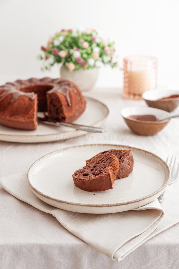 Chocolate Cake with Chocolate Icing on White Wooden Table. Front View ...