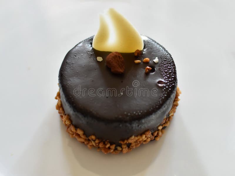 Chocolate Cake with Nuts and Flame Shape on Top Stock Photo - Image of ...