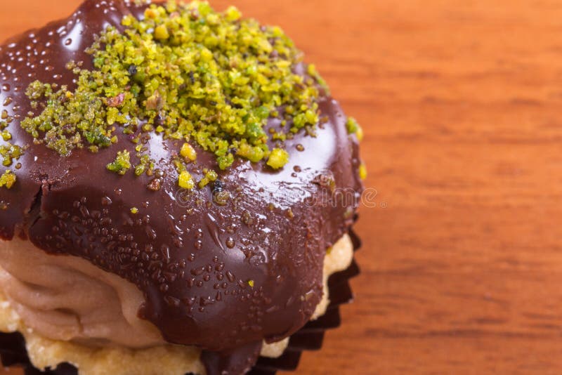Chocolate Cake with Pistachio Particles Stock Image - Image of wooden ...