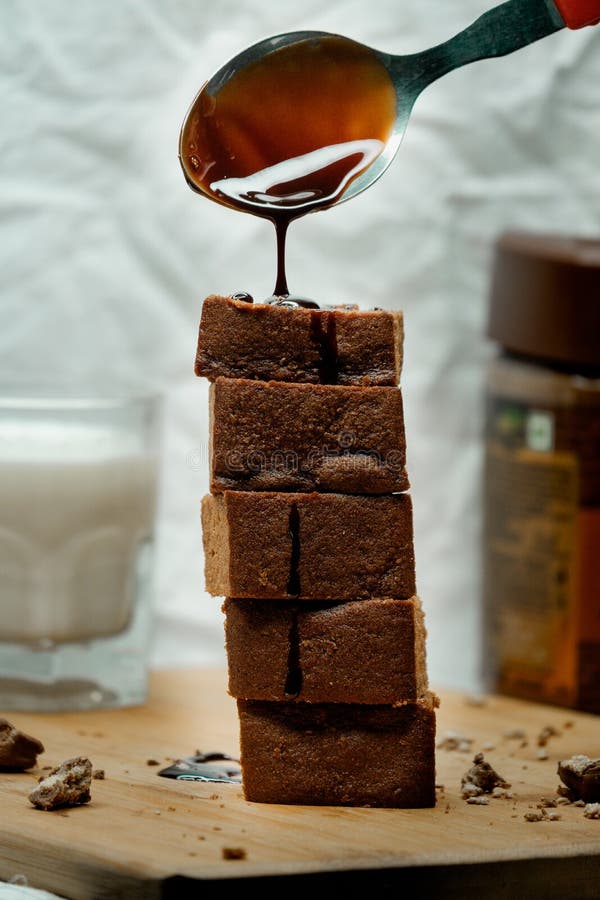 Chocolate Cake Stack with Chocolate Syrup Pouring Stock Image - Image ...
