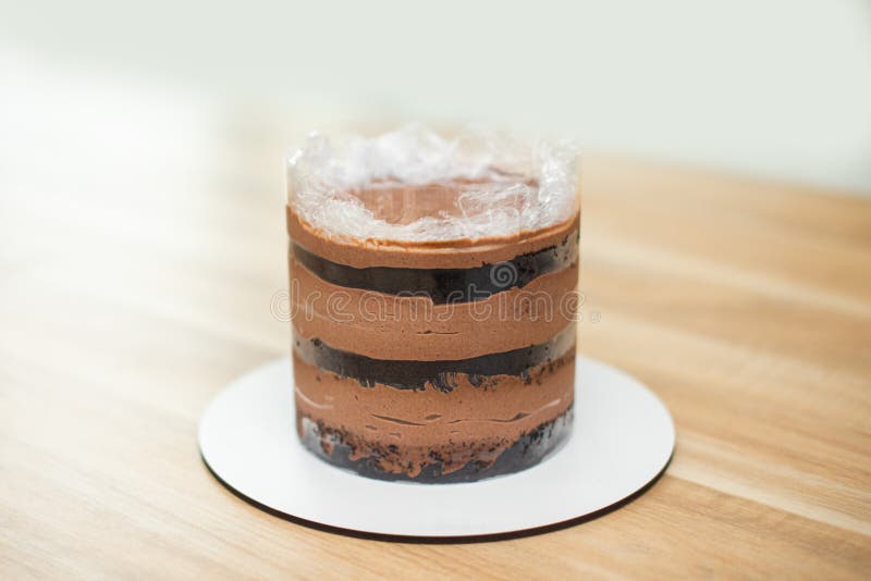 Chocolate Cake in Transparent Packaging during Cooking Stock Image ...