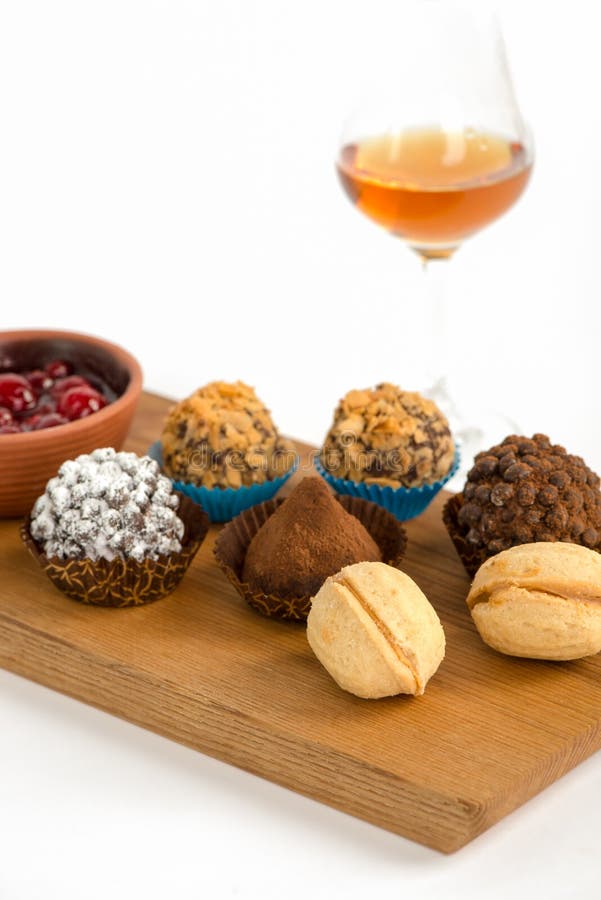 Chocolate Candies with Glass of Cognac Stock Photo - Image of pastry ...