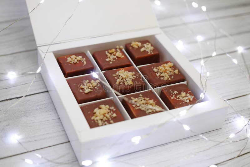 Chocolate Candies with Nuts in a White Gift Box Stock Photo - Image of ...