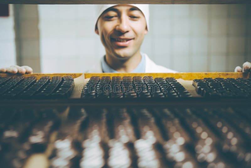 Chocolate candy making stock image. Image of industrial - 131949249