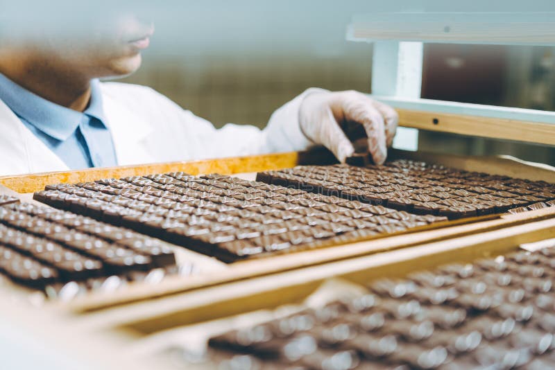 Chocolate candy making stock photo. Image of maker, chocolate - 131949304