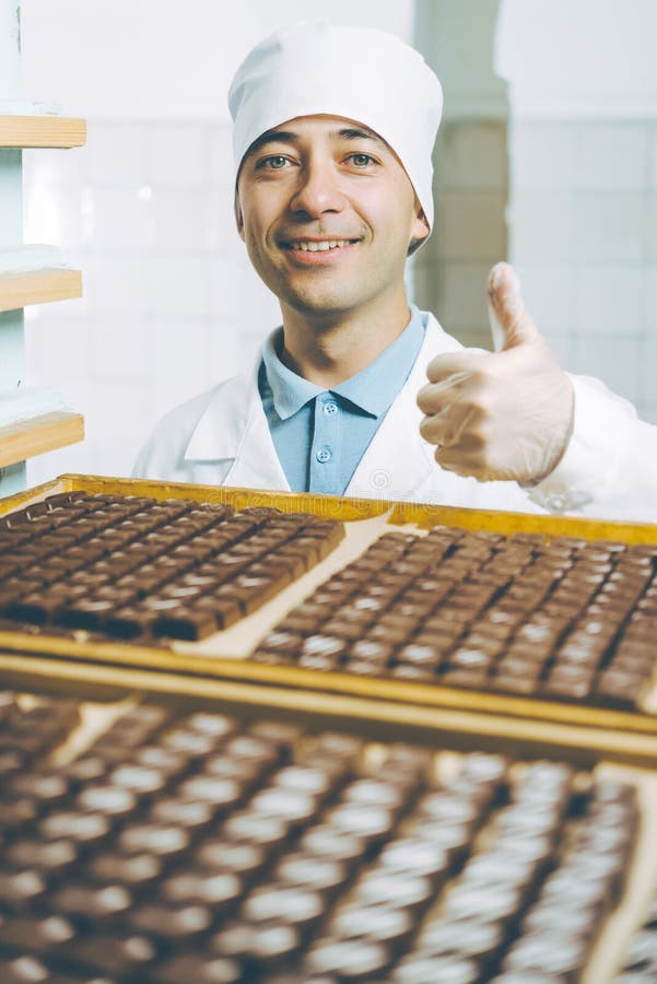 Chocolate candy making stock image. Image of production - 132310605