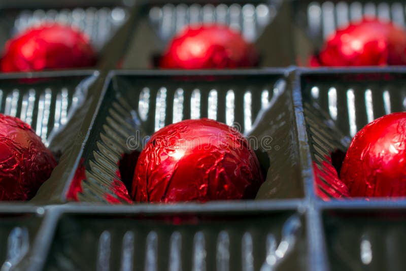 Chocolate Candies in the Red Packaging Stock Photo - Image of candy ...