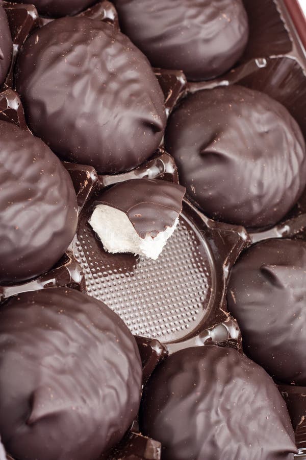 Chocolate Candy Bitten in Half. Stock Photo - Image of goodies ...