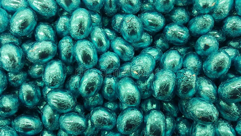 Chocolate Candy Egg Wrapped in Blue Foil Stock Photo - Image of oval ...