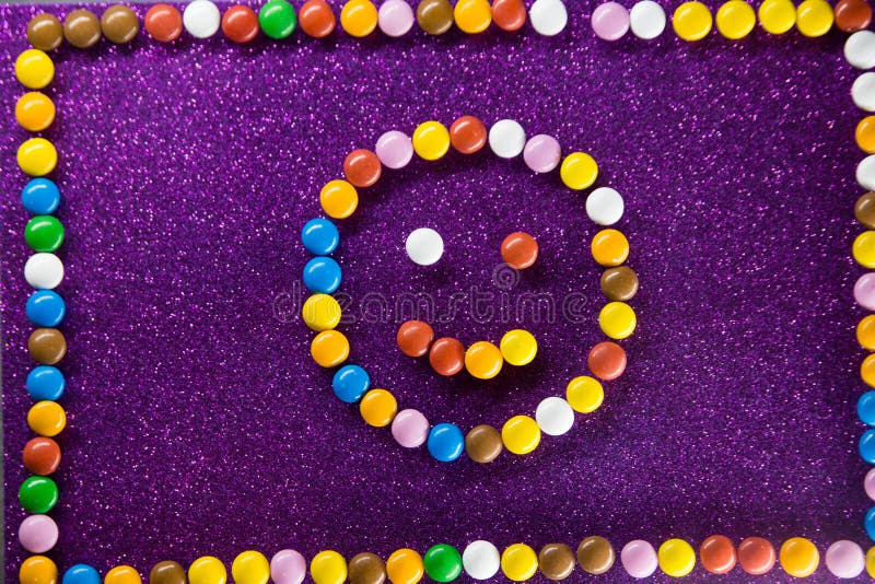 Chocolate Candy Emoticon Laid Out on the Background Stock Photo - Image ...