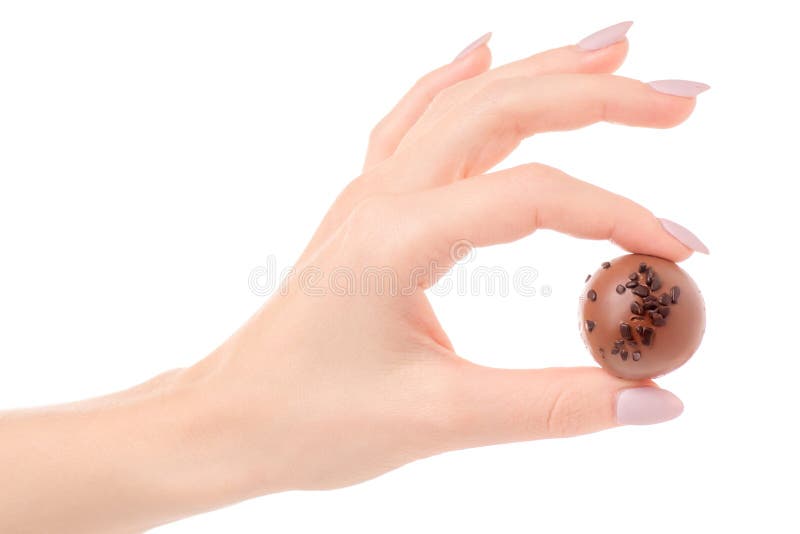 Chocolate candy in hand stock photo. Image of color - 106301310