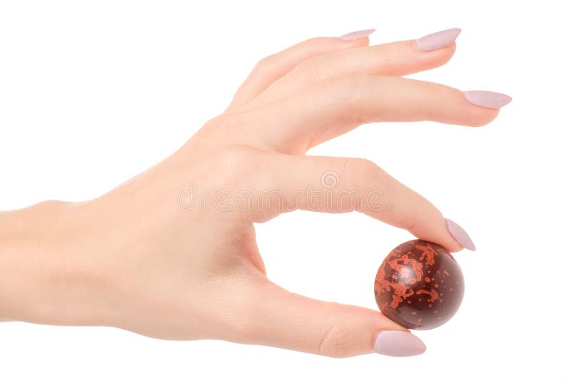 Chocolate candy in hand stock photo. Image of background - 106301264