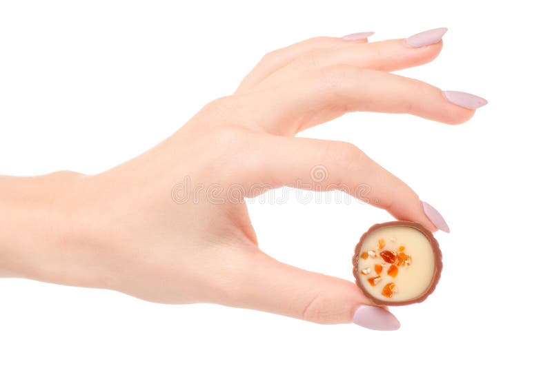 Chocolate candy in hand stock photo. Image of female - 106301266