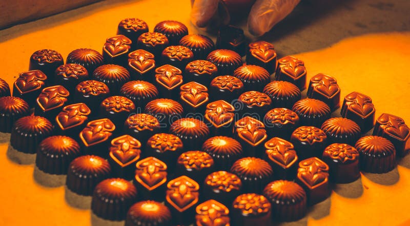 Chocolate candy making stock photo. Image of making - 131949096