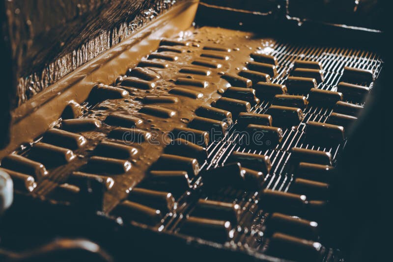 Chocolate candy making stock photo. Image of product - 132610722