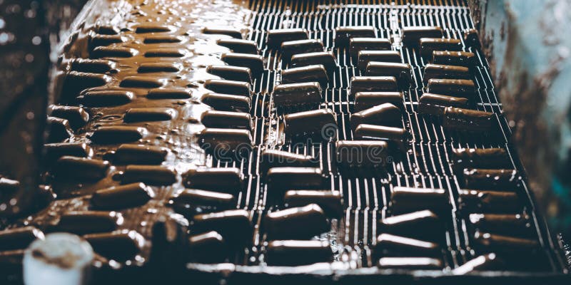 Chocolate candy making stock image. Image of sweet, dark - 132694101