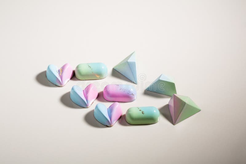 Chocolate Candy Set on Stone Surface with Hard Shadows Stock Photo ...