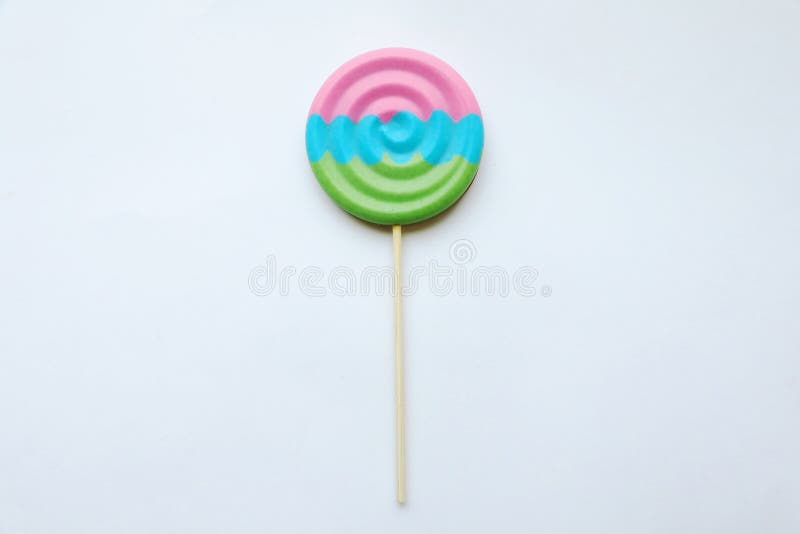 Chocolate candy on a stick stock photo. Image of stick - 241980436