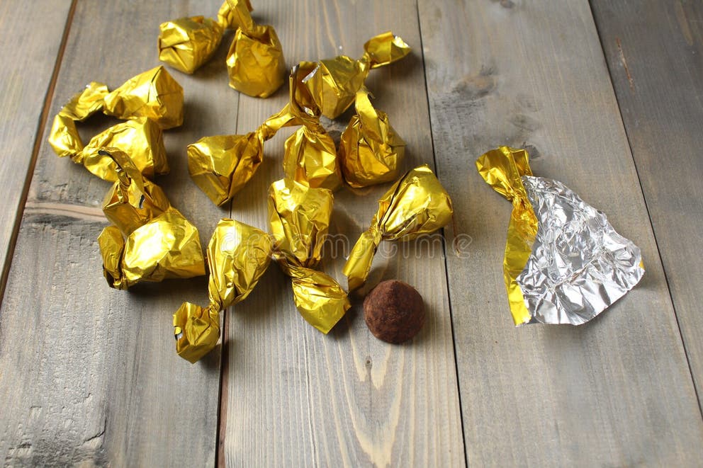 Chocolate Candy and Wrapper for Packaging. Packaging of Homemade Sweets ...