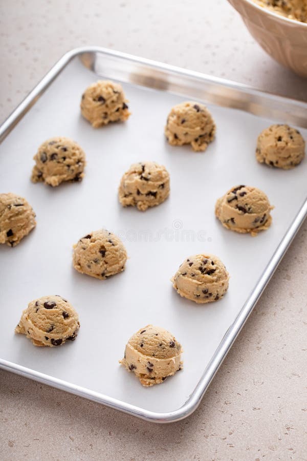 Chocolate Chip Cookie Dough Scoopes on a Cookie Sheet Ready To Be Baked ...