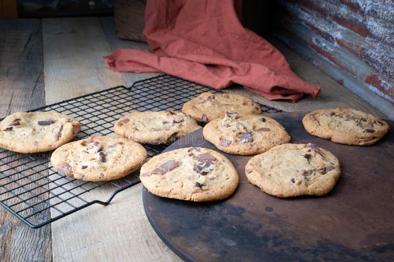 Chocolate Chunk Cookies Cooling on a Black Wire Cooling Rack Stock ...
