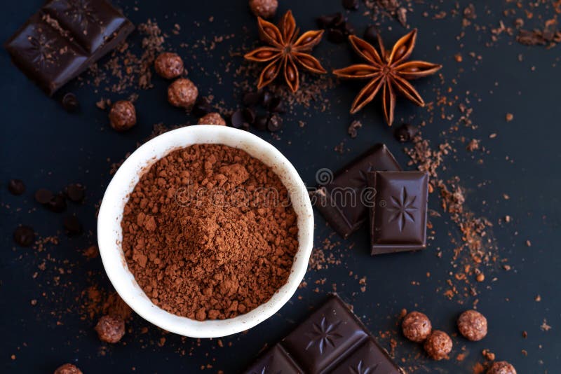 Chocolate Chunks Cocoa Powder and Spice on Dark Slate Table Stock Image ...