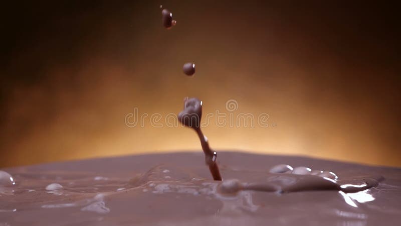 Chocolate Chunks Fall into Chocolate Milk - Slow Motion Stock Footage ...