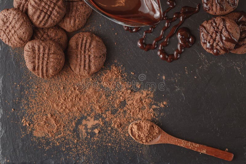 Chocolate with Cocoa Powder in the Spoon. on the Stone Table Stock ...