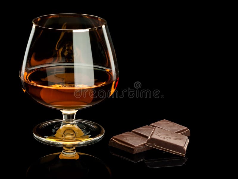 Chocolate and Cognac in a Glass Stock Photo - Image of transparent ...