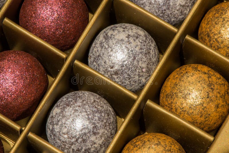 Chocolate colour balls stock photo. Image of sugar, brown - 84627250