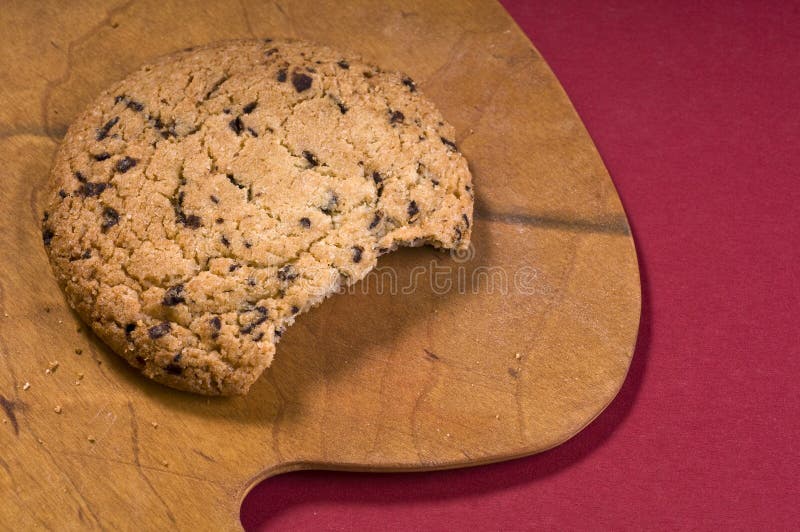 Chocolate Cookie Over On A Cutting Board Stock Image - Image of colored ...