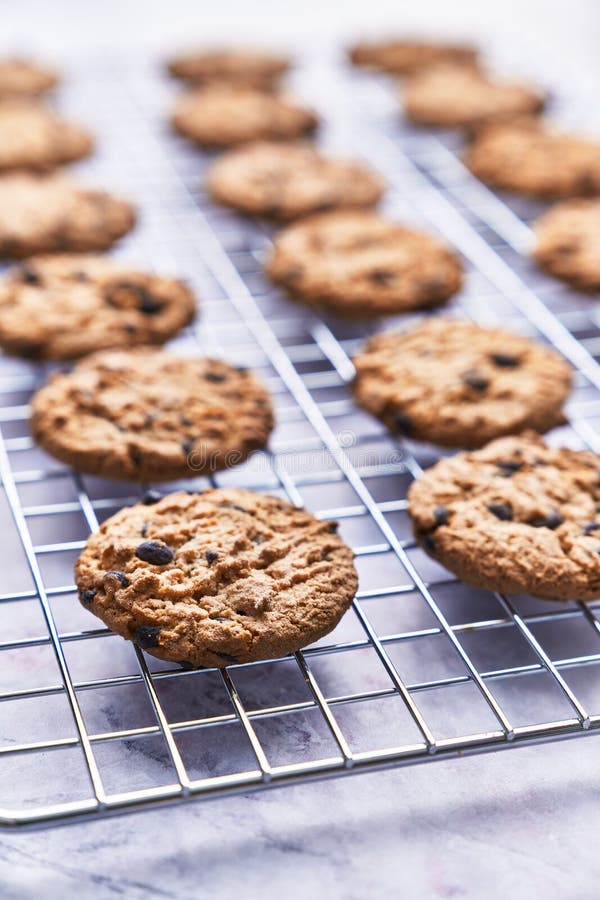 Chocolate Cookies Served on a Grid Rack on a Marble Table Stock Photo ...