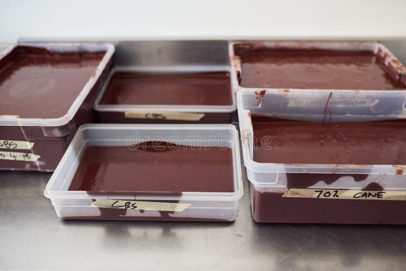 Chocolate Cooling in Trays on a Confectionary Making Factory Table ...
