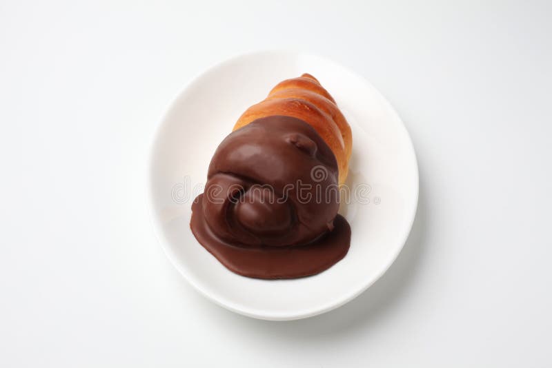 Chocolate Cornet Roll Bread on Plate on White Background Stock Image ...
