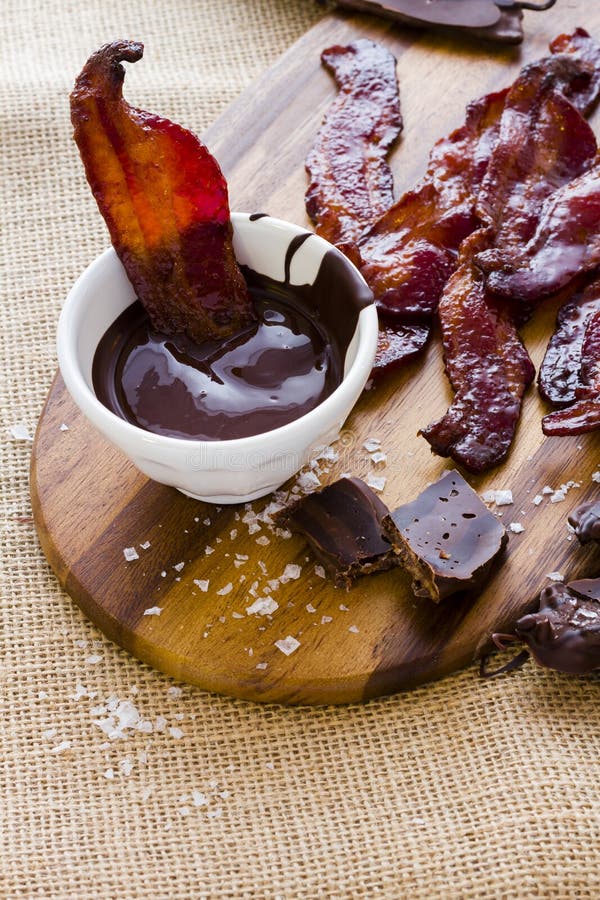 Chocolate covered bacon stock image. Image of coating - 30770441