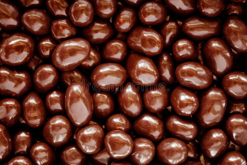 Chocolate Covered Peanuts stock image. Image of group - 32612199