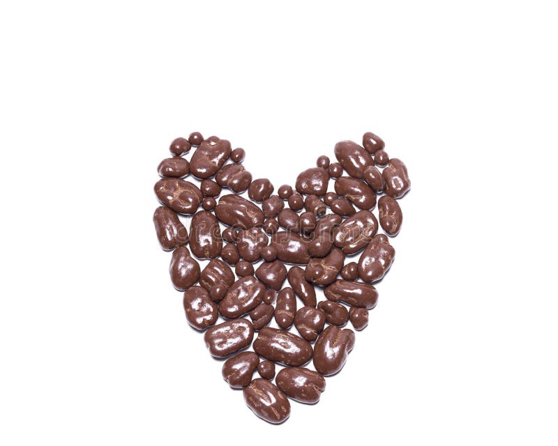 Chocolate Covered Pecan Pieces Arranged in a Heart Shape Stock Image ...