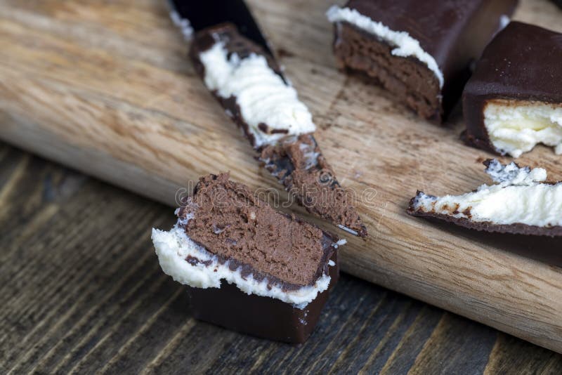 Chocolate-covered Sweet Cheese on the Table Stock Photo - Image of ...
