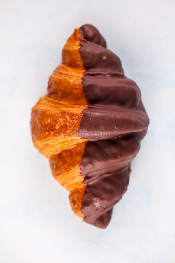 Chocolate Dipped Pastry with a Flaky Texture on a Light Backdrop Stock ...