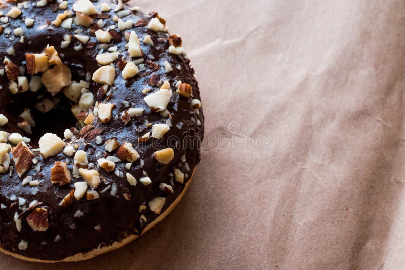 Chocolate Donut with Diced Hazelnut Pieces. Stock Photo - Image of ...