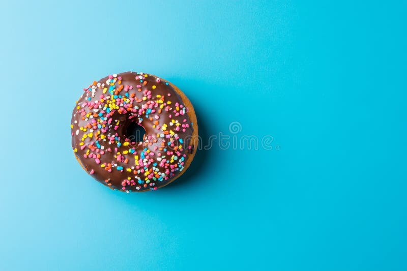 Chocolate Donut Isolated on Blue, Top View. Stock Photo - Image of blue ...