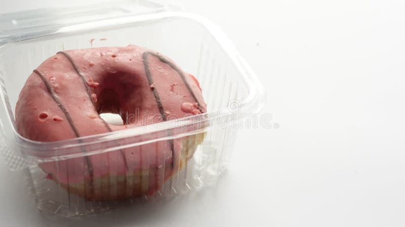 Chocolate Donuts in a Plastic Take Away Packet Stock Footage - Video of ...