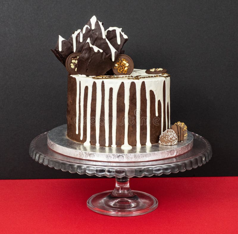 Chocolate drip cake stock image. Image of chocolate - 140293959