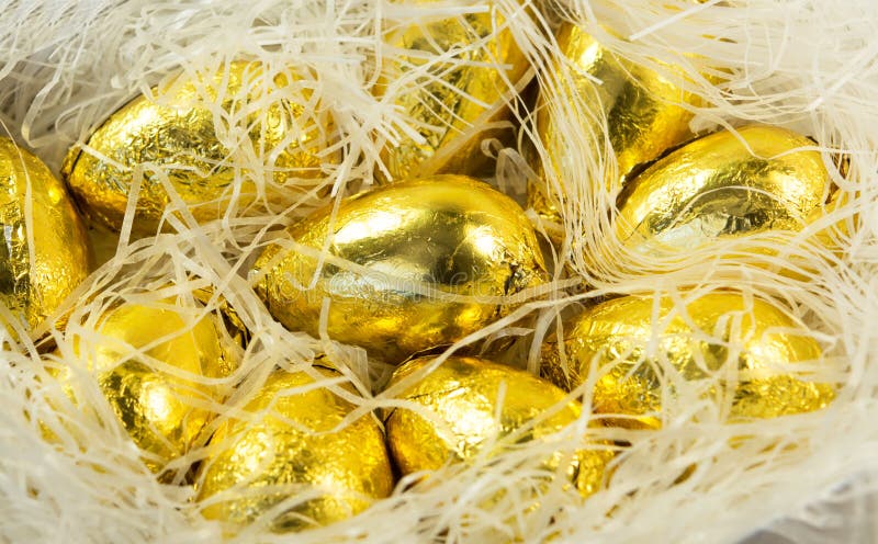 Chocolate Easter Eggs in Bright Golden Cover Stock Image - Image of ...
