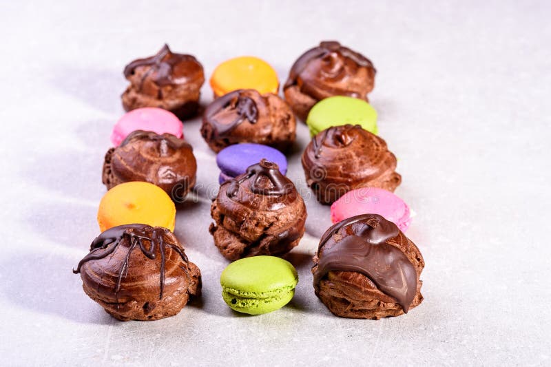 Chocolate Eclairs and Macaroons for the Restaurant Menu6 Stock Image ...