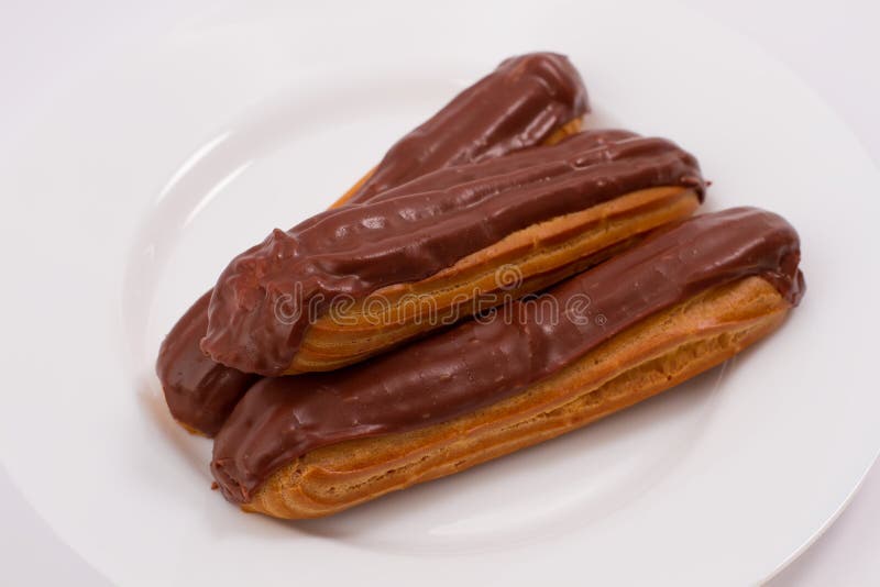Chocolate eclairs stock photo. Image of custard, candy - 48235452