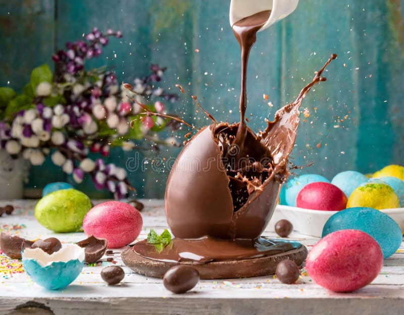 Chocolate Egg Exploding and Melting on the Table. Colored Eggs in the ...