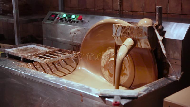 Chocolate Factory, the Process of Making Chocolate. Pouring Liquid ...